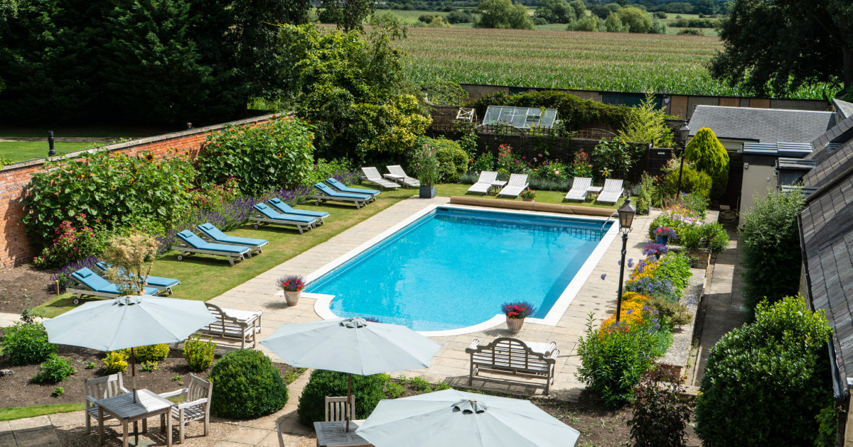 Enjoy Poolside Dining in our Walled Garden Terrace